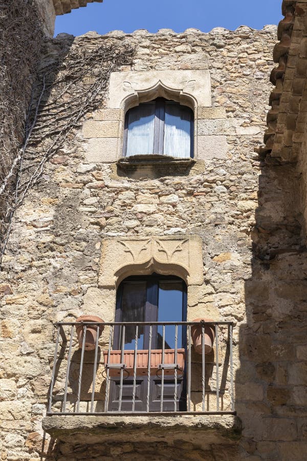 Facade in Pals of a Stone Tower with a Window and a Balcony Stock Photo ...