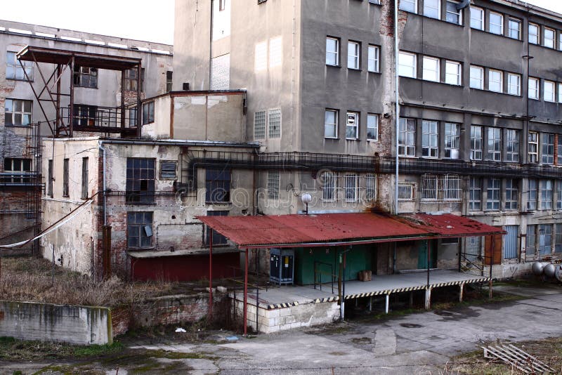 Old factory yard stock image. Image of grass, dark, yard - 14020577