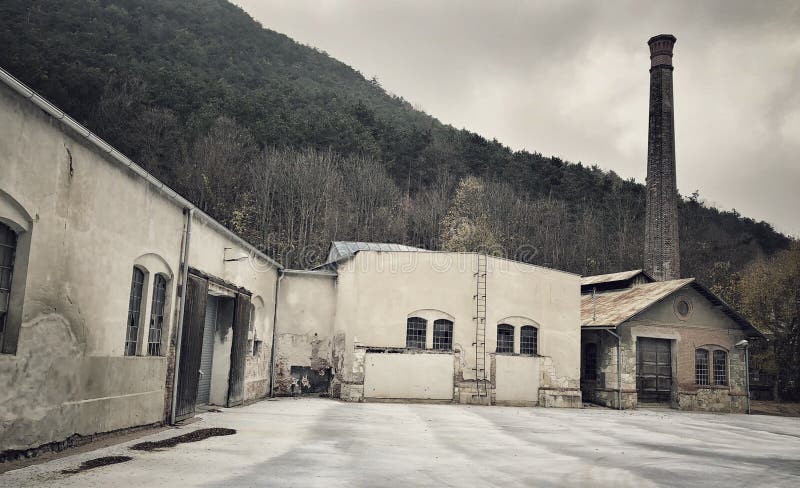 An Old Factory from Outside Stock Photo - Image of roof, mountain ...