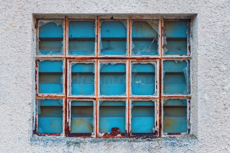 Old Grid Windows with Broken Glass on Exterior Wall Stock Photo - Image ...