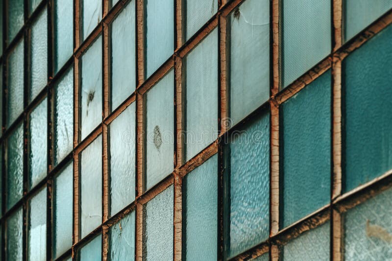 Old Grid Windows with Broken Glass on Exterior Wall Stock Photo - Image ...