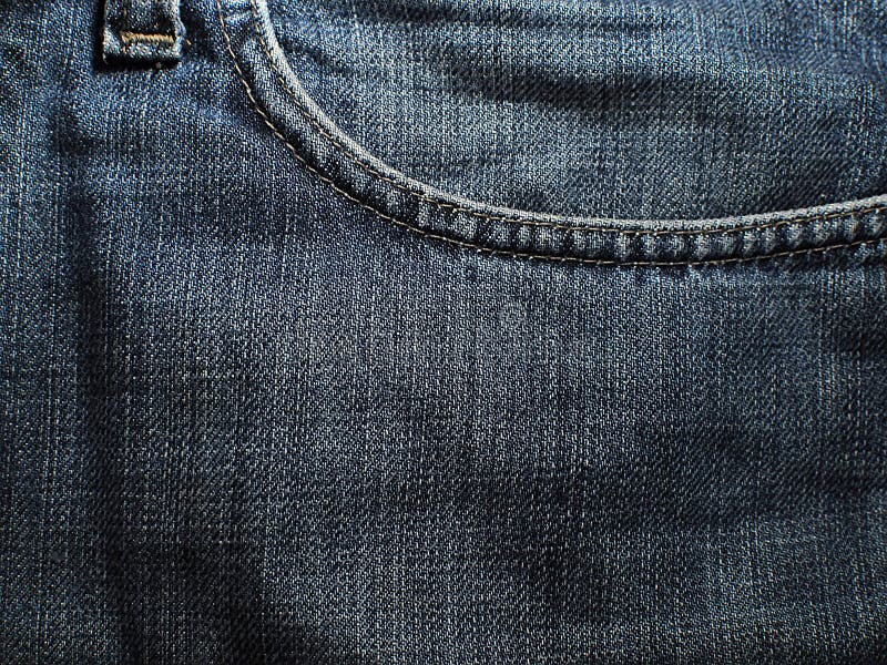Faded blue jeans stock image. Image of button, cotton - 6865743