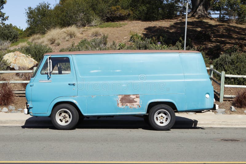 Old Faded Blue Van Parked on Street with Rust Spot Stock Photo - Image ...