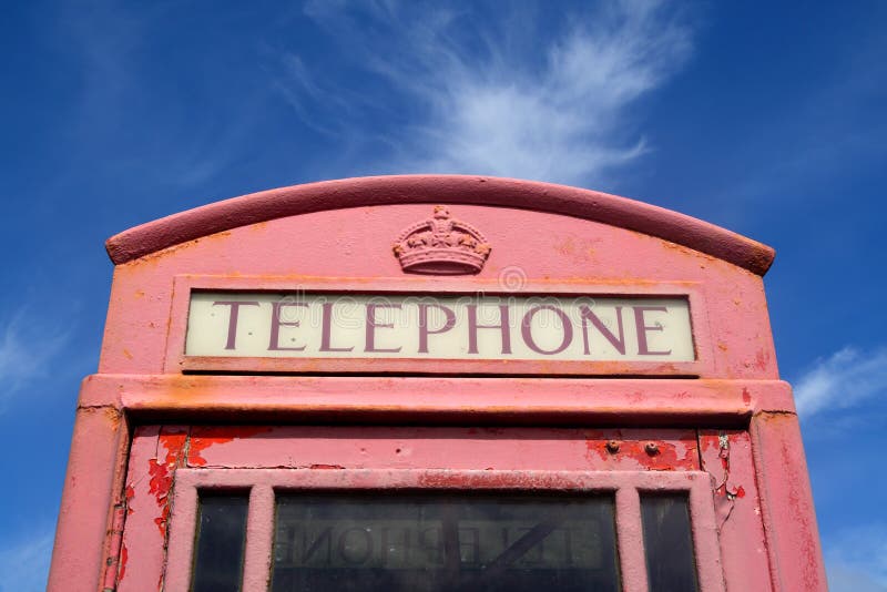 Old faded red telephone. stock photo. Image of london - 2428748