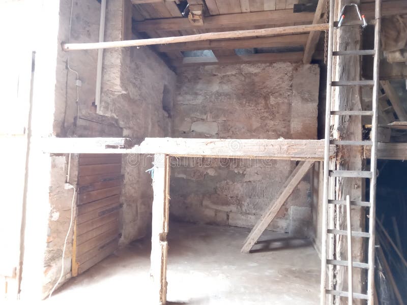 Old farm building inside stock photo. Image of building - 185926258