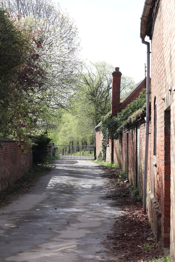 Side Angle of Old Farm Buildings on a Country Path Stock Photo - Image ...