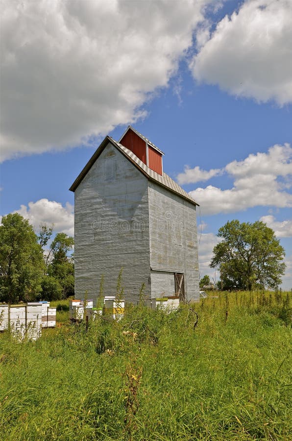 Farm with Grain Elevator stock image. Image of barbed - 16899683