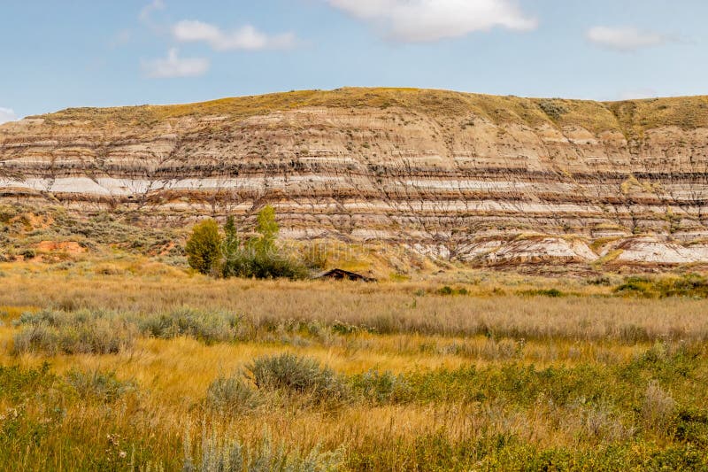 Old Farm Structure in the Shadow of the Badlands. Rosedale, Alberta ...