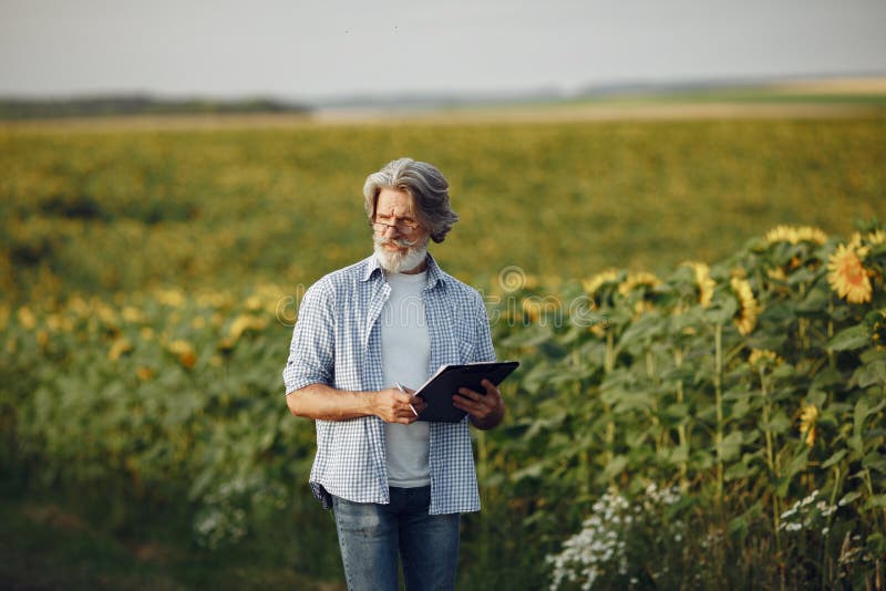Old Farmer in Shirt Standing on Field with Notebook Stock Photo - Image ...