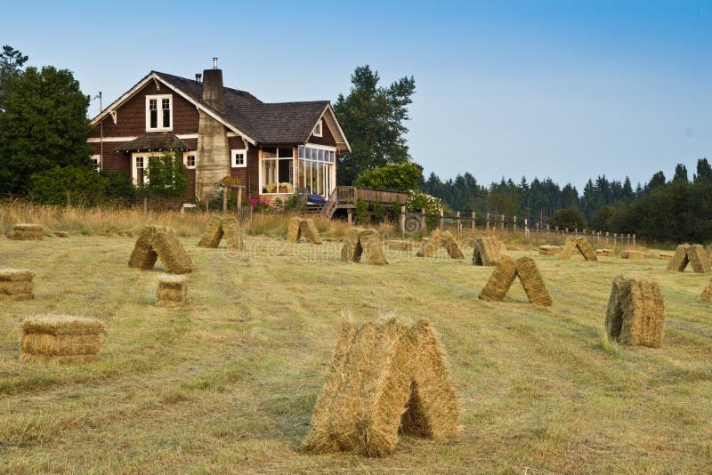 Old Farmhouse with Hay Field Stock Photo - Image of nature, agriculture ...