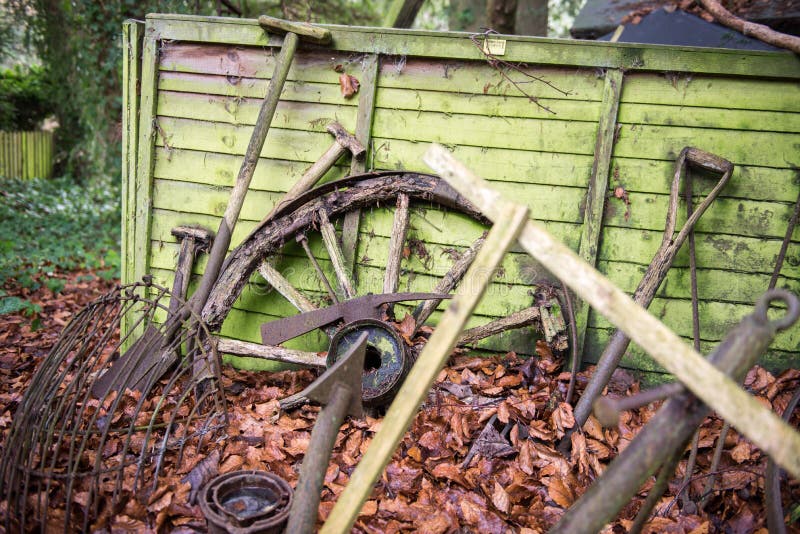 Old Farming Tools Left Outside Stock Photo - Image of wooden, barn ...