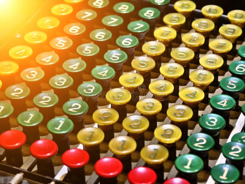 An Old Fashioned Adding Machine Features a Drawer Located Underneath it ...