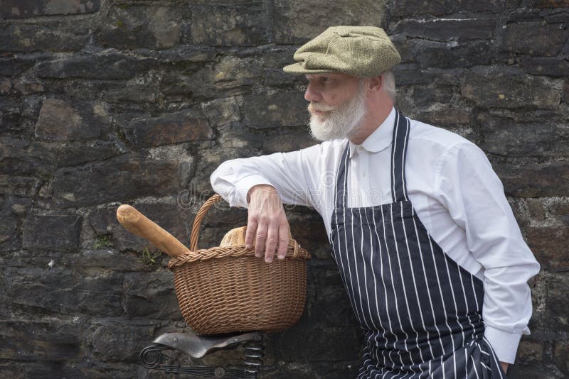 Old Fashioned 1940 Baker with Bread Basket Stock Image - Image of ...