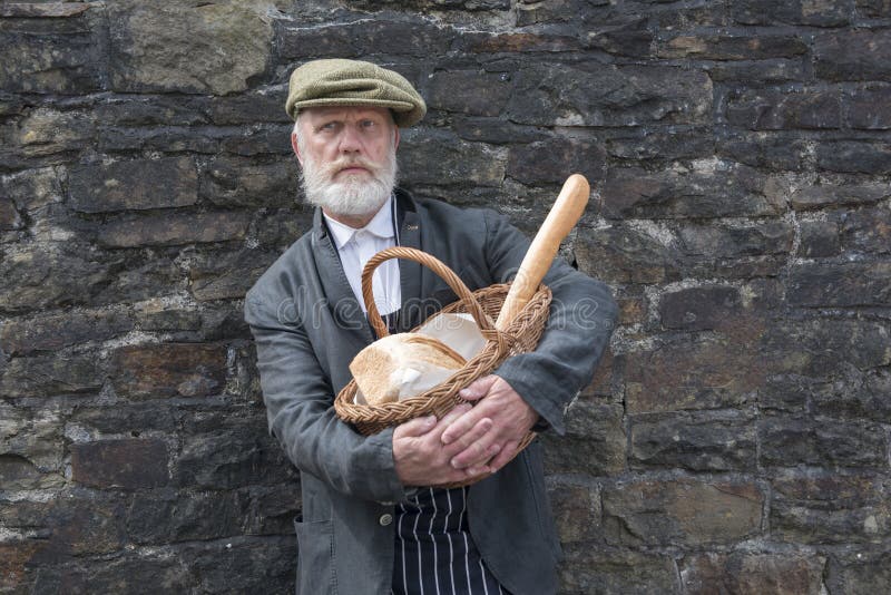 Old Fashioned 1940 Baker with Bread Basket Stock Photo - Image of ...
