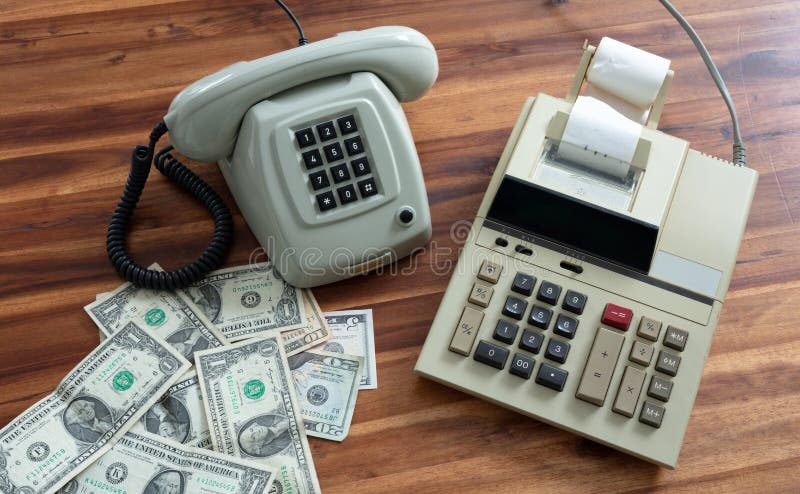 Old Fashioned Calculator, Telephone and Dollars Stock Photo - Image of ...