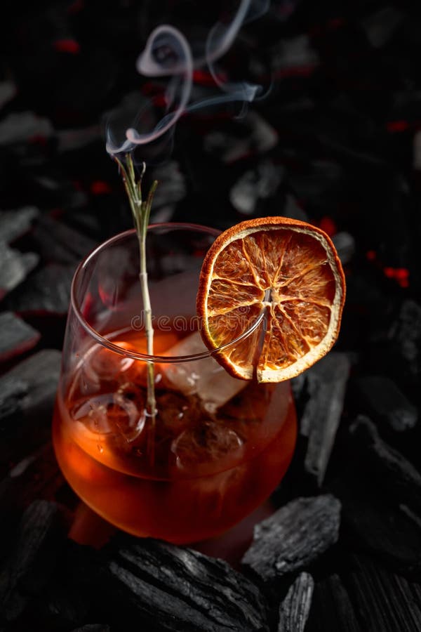 Old Fashioned Cocktail With Ice Dried Orange Slice And Rosemary Stock