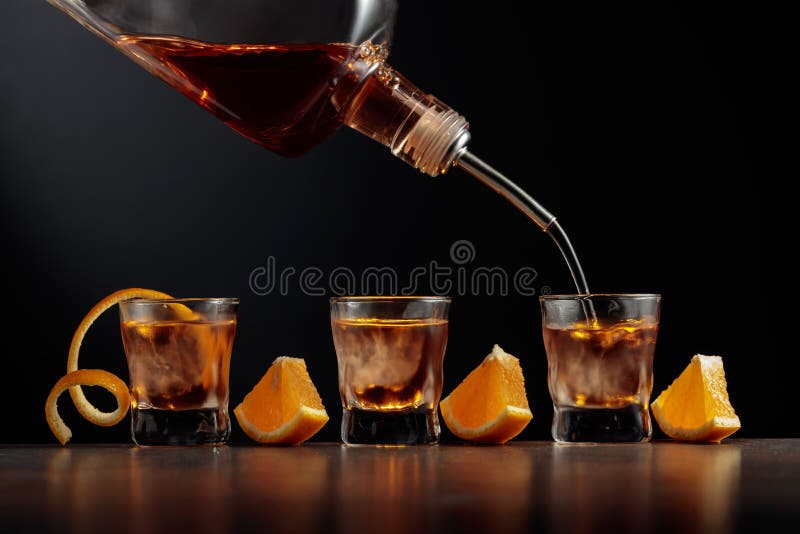 Old Fashioned Cocktail With Ice Dried Orange Slice And Rosemary Stock