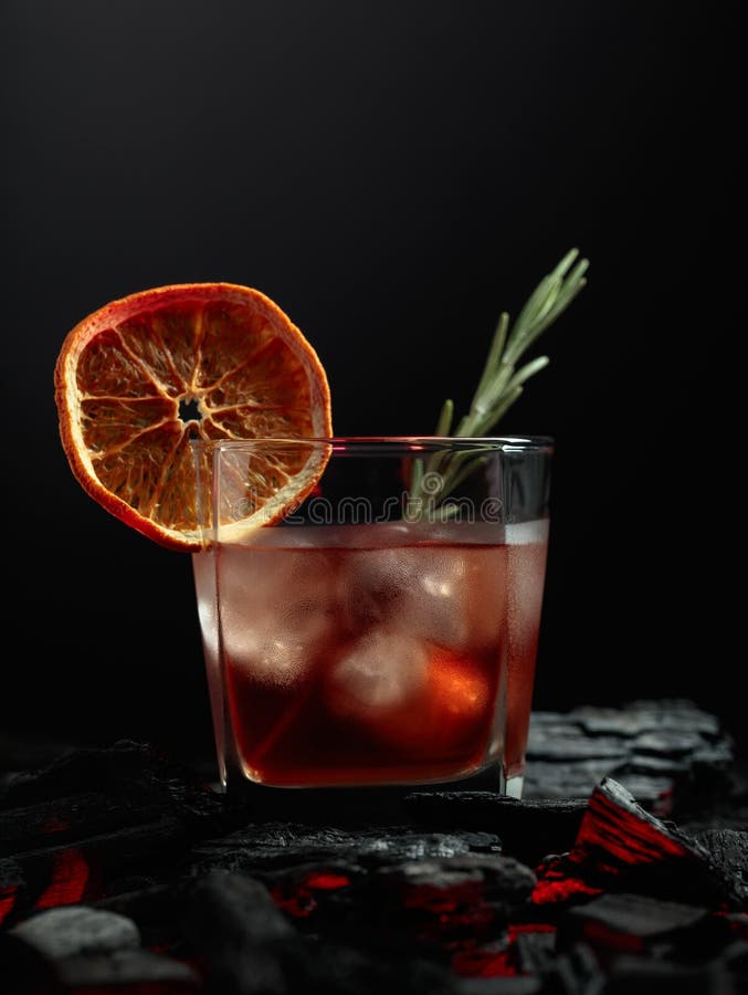 Old Fashioned Cocktail With Ice Dried Orange Slice And Rosemary Stock