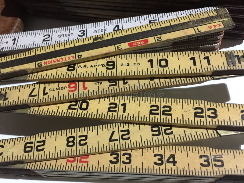 Old Fashioned Folding Rulers on Table Stock Image - Image of background ...
