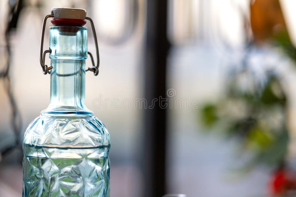 An Old-fashioned Fresh Water Bottle on a Restaurant Table Stock Image ...