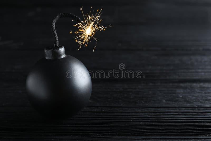 Old Fashioned Fuse Bomb on Black Wooden Table. Space for Text Stock ...