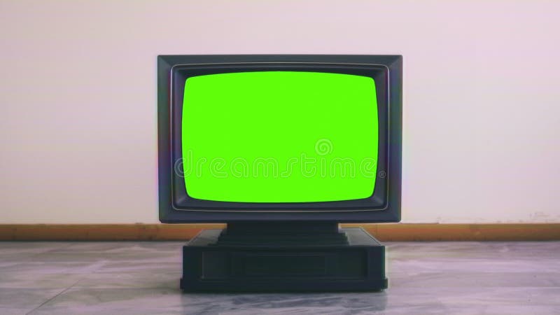 Old-fashioned Green Screen TV with Screen Displaying Glitchy Patterns ...
