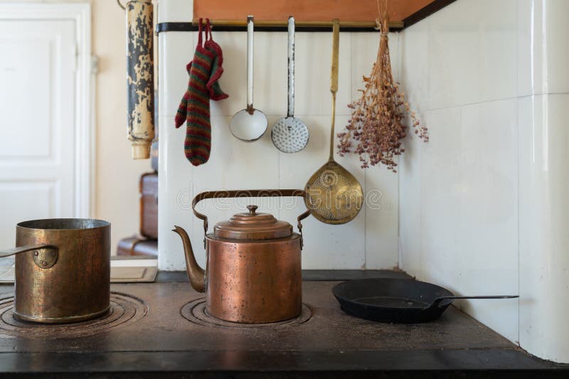An Old-fashioned Kitchen Interior. Set of Ancient Kitchen Utensils ...