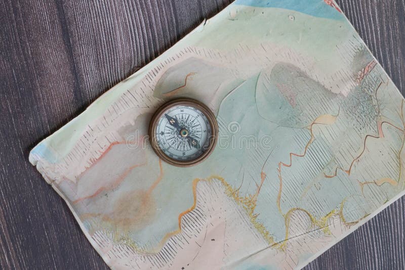 Old Fashioned Navigational Compas on a Hand Made Map Ready for ...