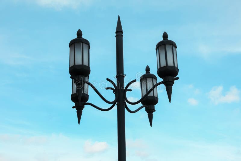 Old Fashioned Street Light Lamp Against Cloudy Sky Stock Image - Image ...