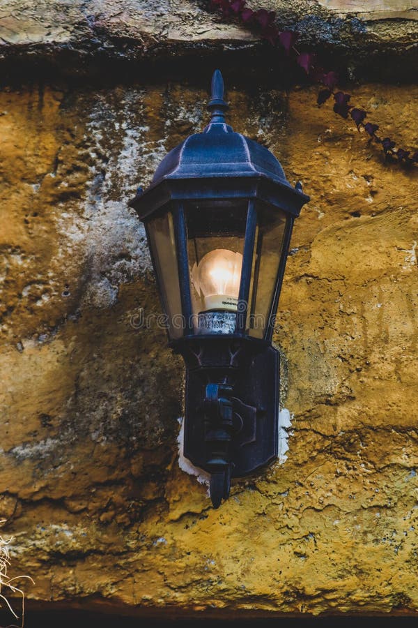 Old-fashioned Streetlight on a Brick Wall Stock Photo - Image of energy ...
