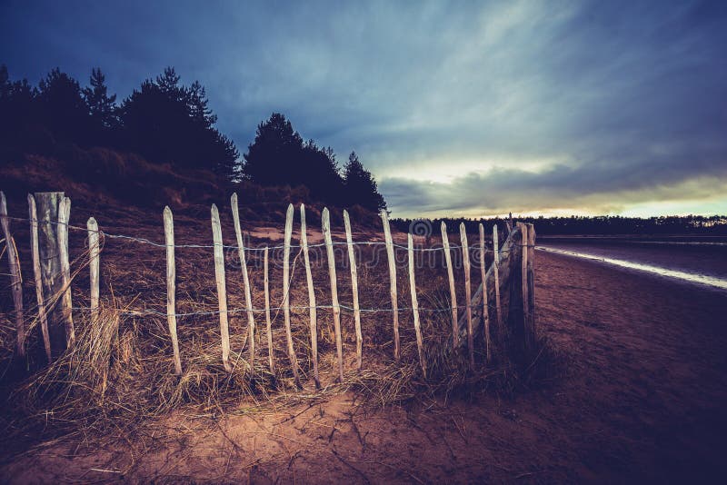 Old Fence on the Beach at Sunset Stock Image - Image of dune, horizon ...