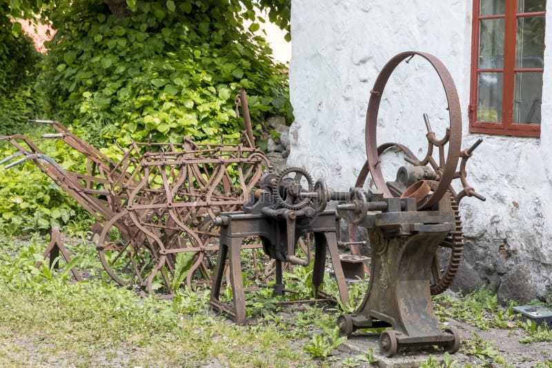 Old Field Implements in Front of an Old Forge Editorial Stock Photo ...