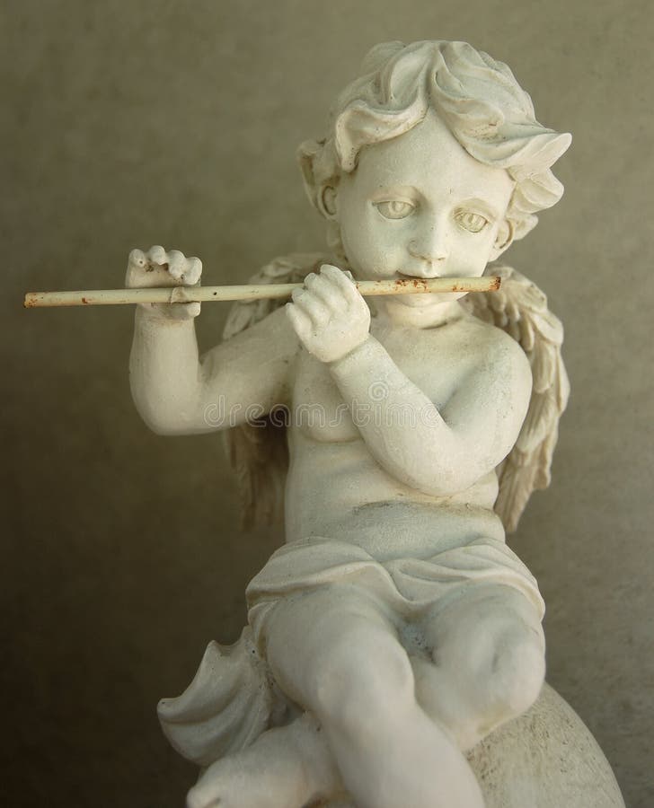 Old Figurine - Flute Playing Angel Picture. Image: 6073768
