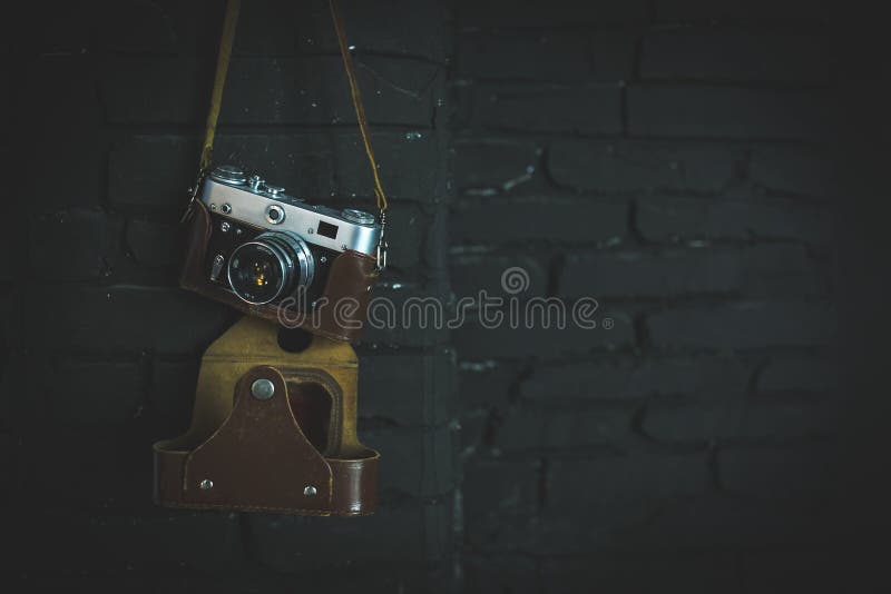 Old Film Camera on Black Wall. Image for Design Stock Photo - Image of ...