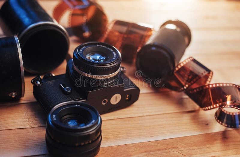 Old Film Camera and a Roll of on Wood Stock Image - Image of classic ...