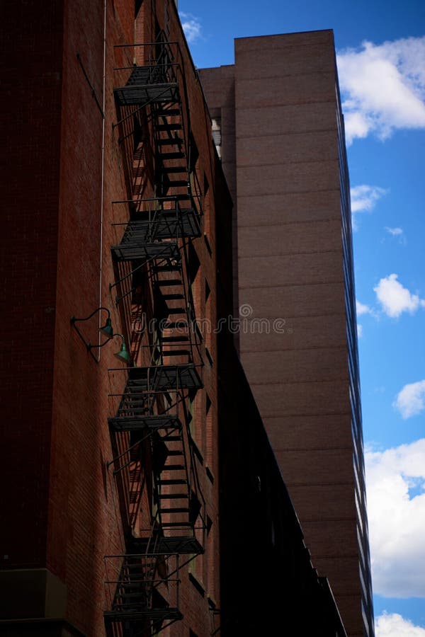 Old Fire Escape on an Old Brick Wall. American Vintage Style Stock ...