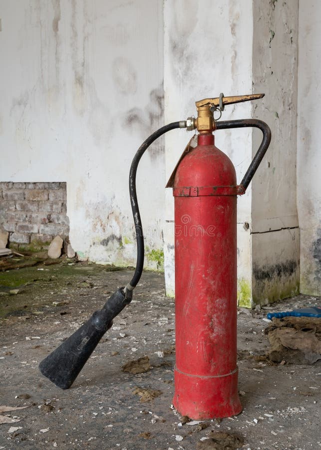Old Fire Extinguisher in Abandoned Building Stock Photo - Image of ...