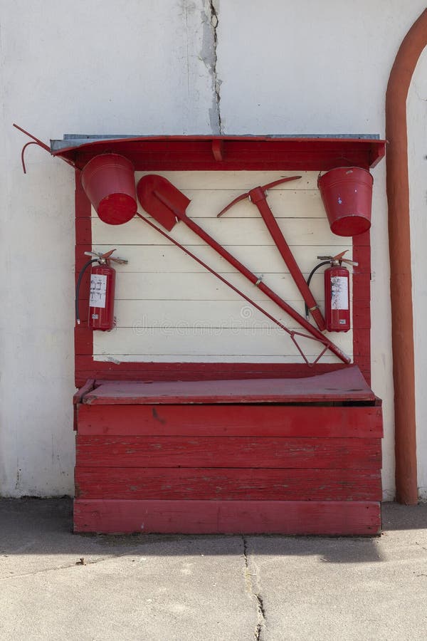 Old Fire Shield with a Set of Fire Extinguishing Tools Stock Photo ...