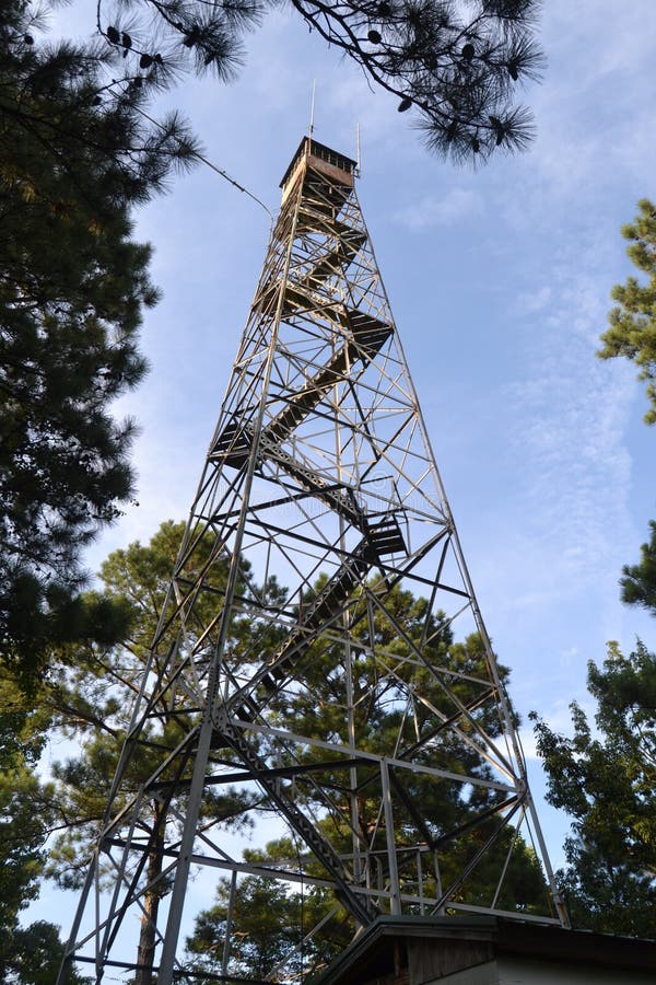 Old fire tower in forest stock image. Image of building - 188089257