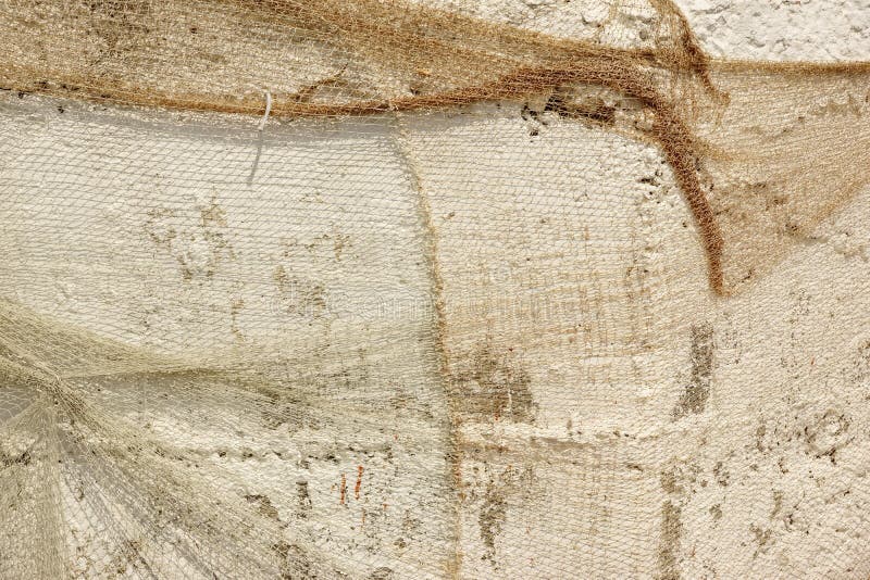 Old Fish Net Hanging and Covered Whitewashed Rustic Concrete Wall Stock ...