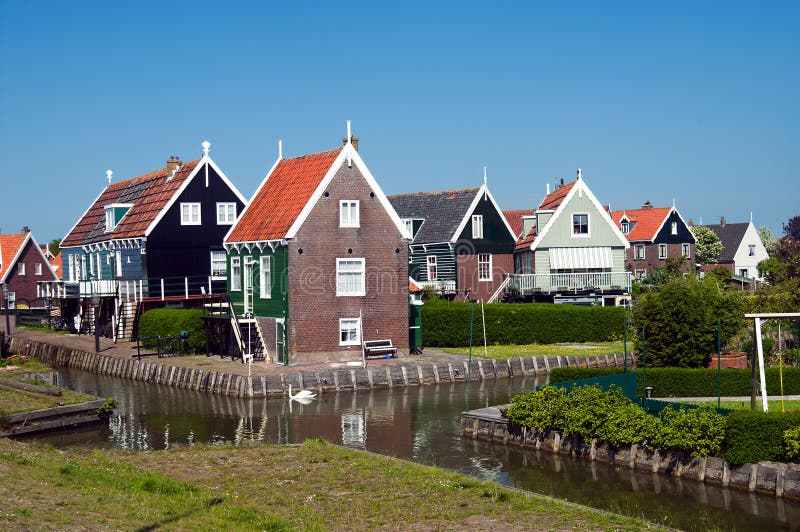 Old fishing green cottages stock image. Image of netherlands - 13461675