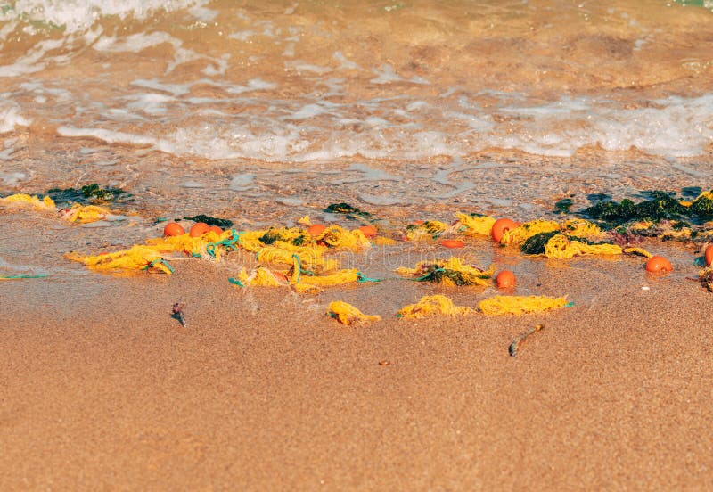 Old Fishing Net in Seashore Sand Stock Photo - Image of beach, sand ...