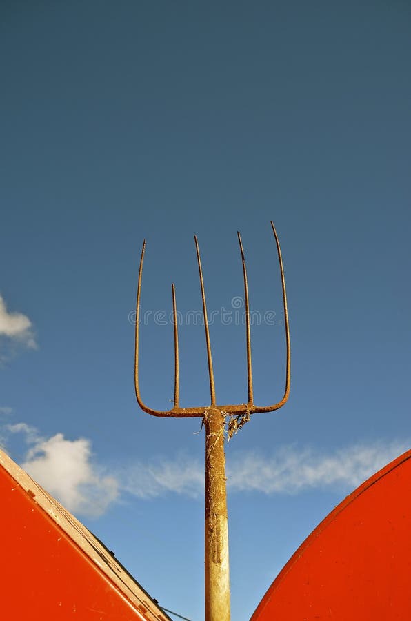 Old five tined pitchfork stock image. Image of buildings - 61538141