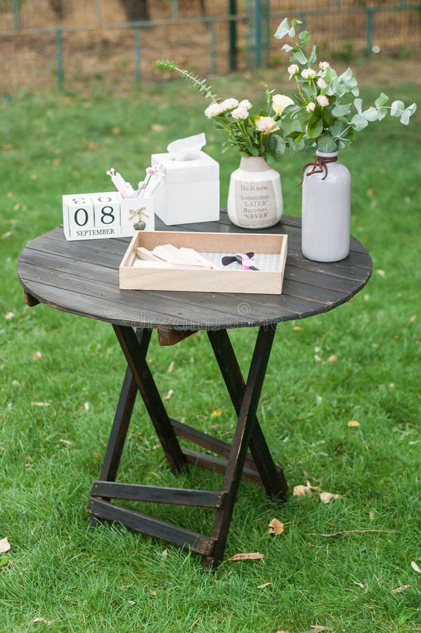 Old Folding Round Table with Flower Arrangement Stock Image - Image of ...