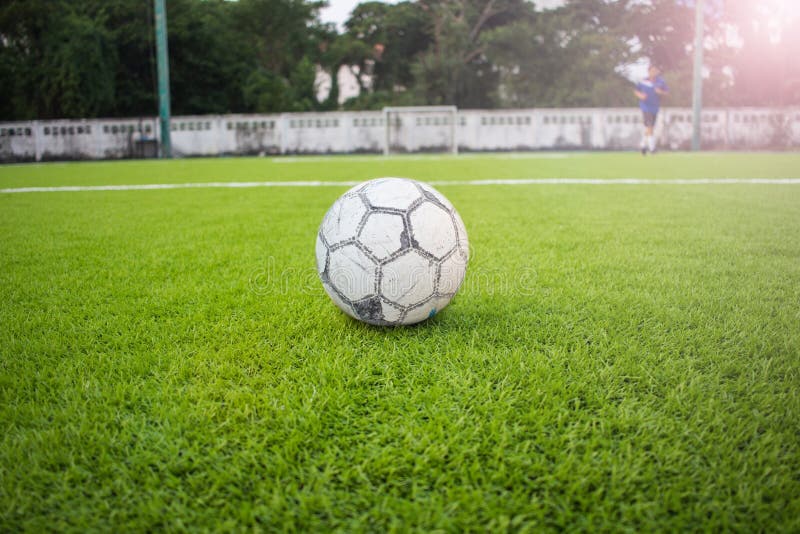 Old Football on Artificial Turf Football Field Green Stock Image ...
