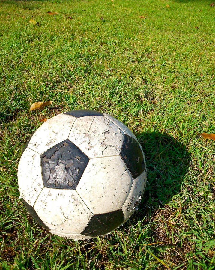 Old Football on Grass Field Stock Photo - Image of ground, black: 48456592