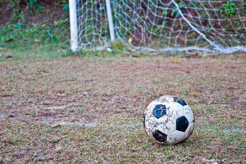 The Old Football on the Grass Stock Image - Image of football, kick ...