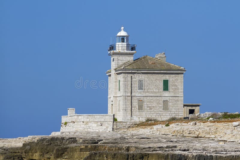 Old, Forgotten Lighthouse on a Rocky Shore Stock Photo - Image of coast ...