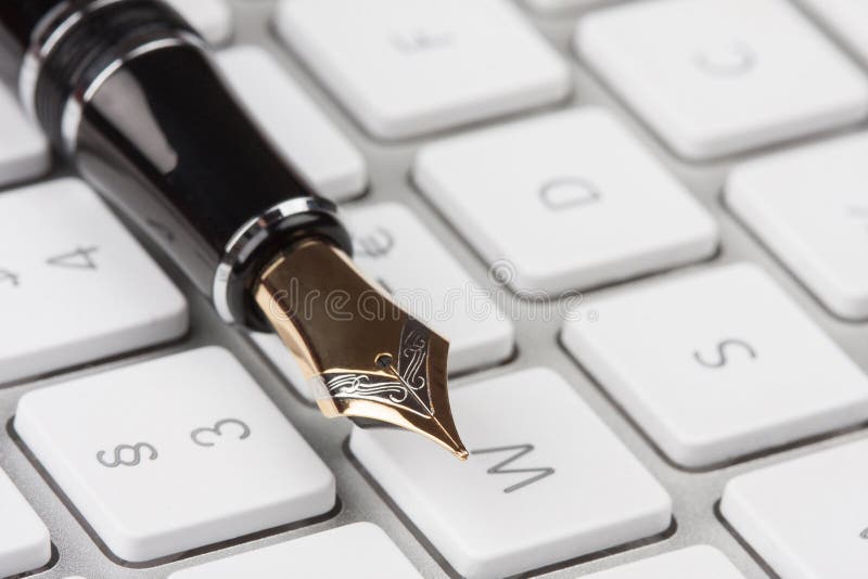 Old Fountain Pen Lying on a Computer Keyboard Stock Image - Image of ...