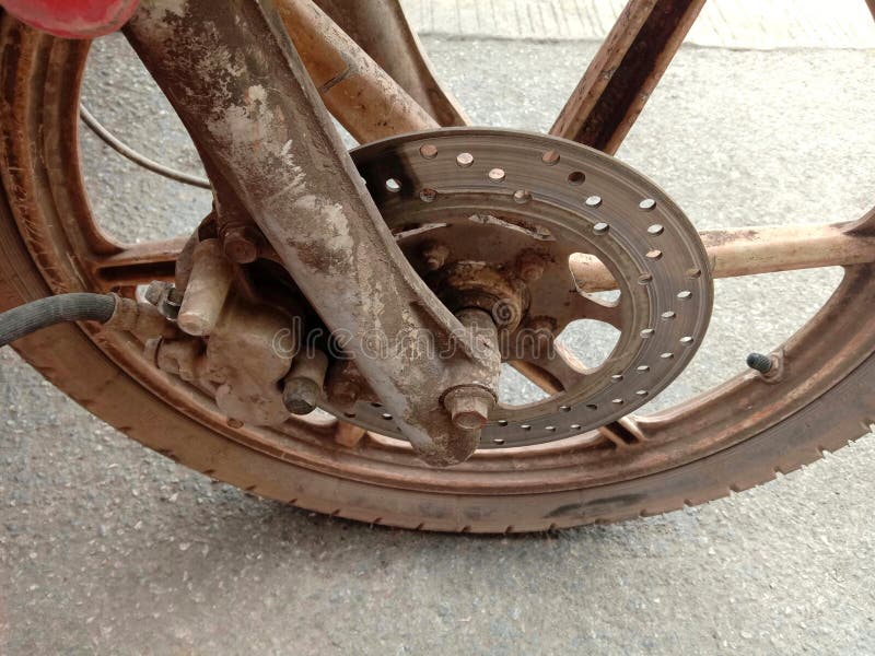 Old Front Disc Brake Motorcycle at Frame on Cement Flooring Closeup ...